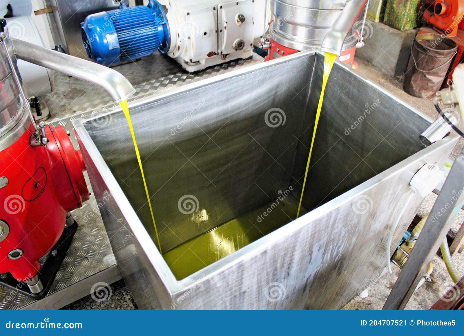 Extra Virgin Olive Oil Extraction Process in Olive Oil Mill Stock Image ...