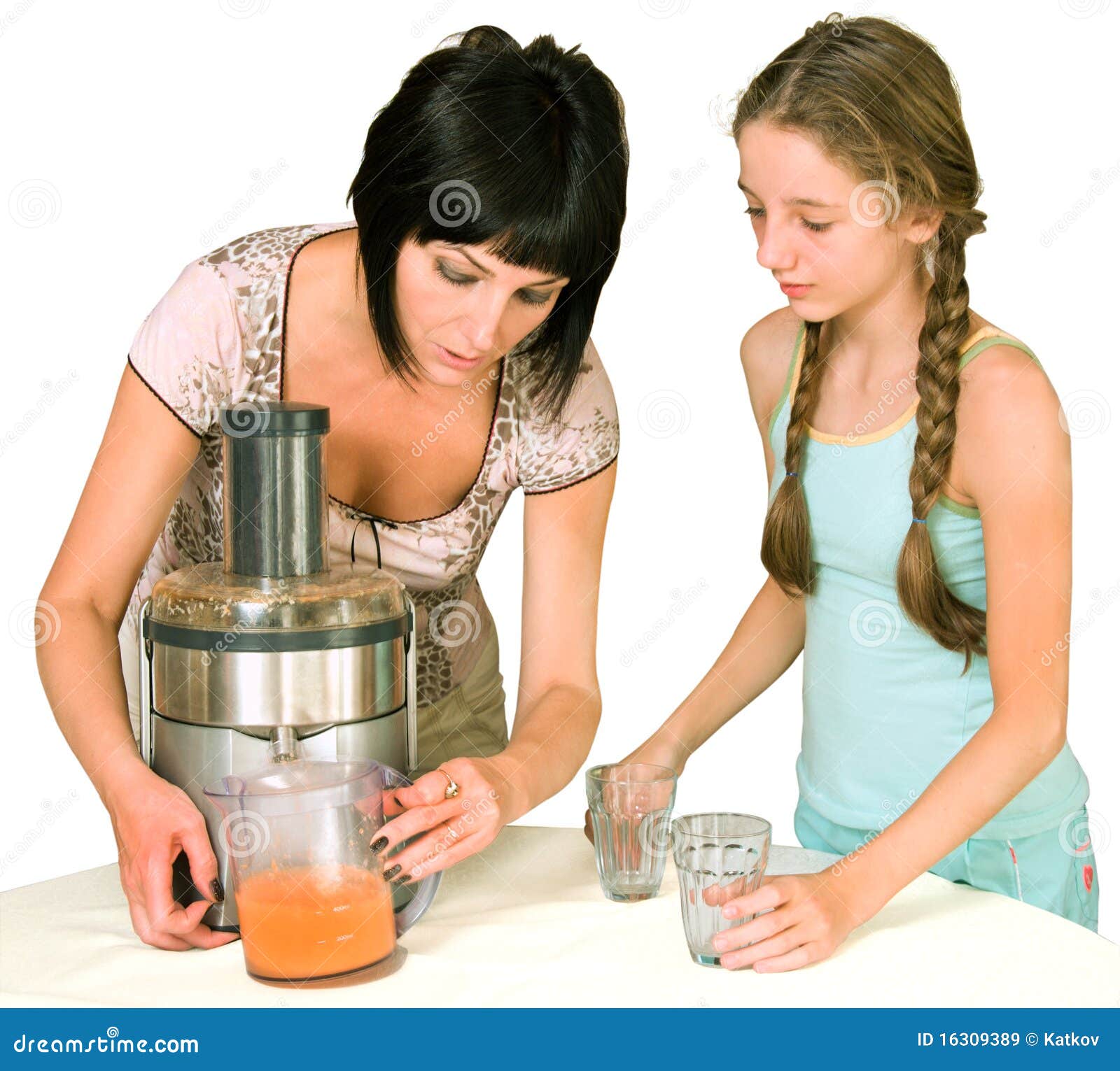 Extracting a juice stock image. Image of home, face, indoors - 16309389