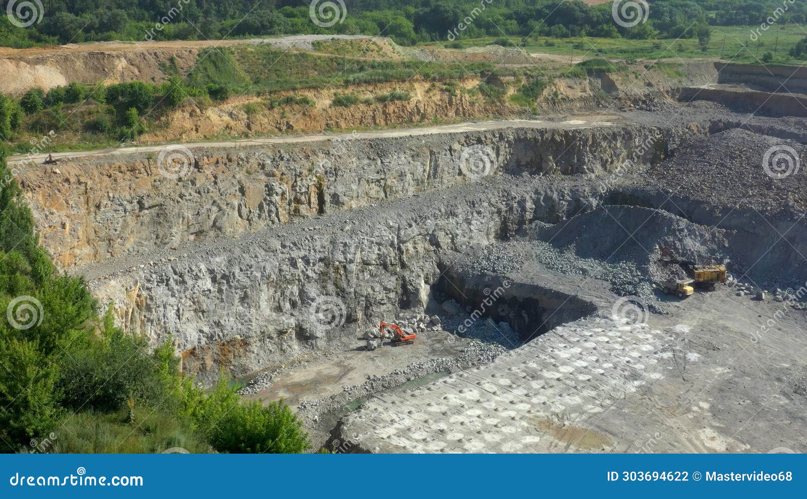 Extraction of Granite. Open Cast Mine. Stone Quarrying Stock Photo ...