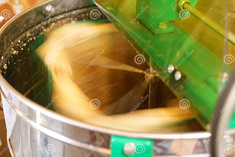 Extraction of Honey from Honeycombs of Nesting Frames in a Honey ...