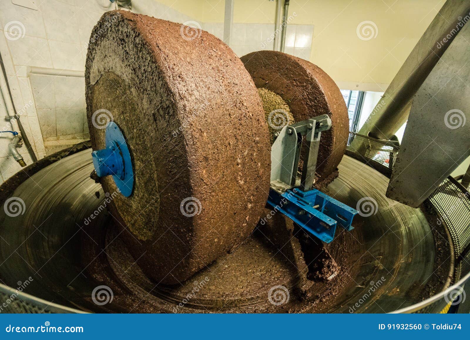 Extraction of Oil from Olives Using a Circular Grinding Stone. Stock ...