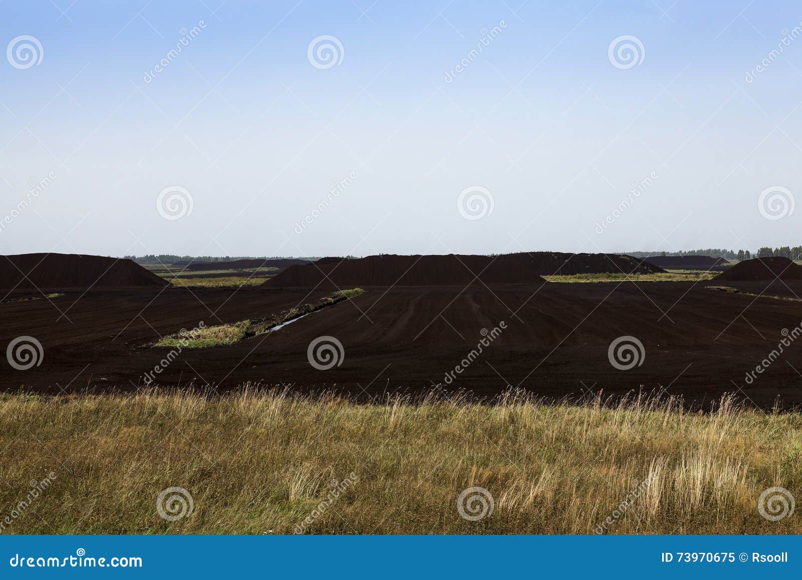 Extraction of peat stock image. Image of environment - 73970675