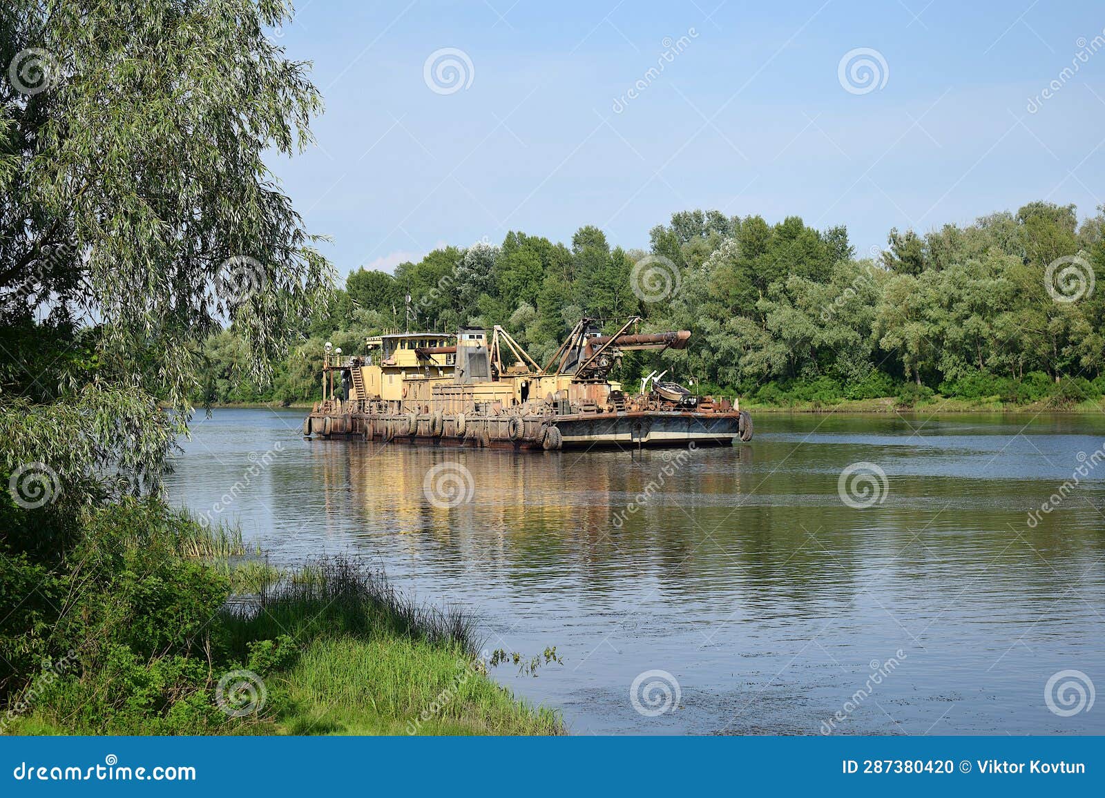 Extraction of Sand by a Dredge in the River Stock Photo - Image of ...