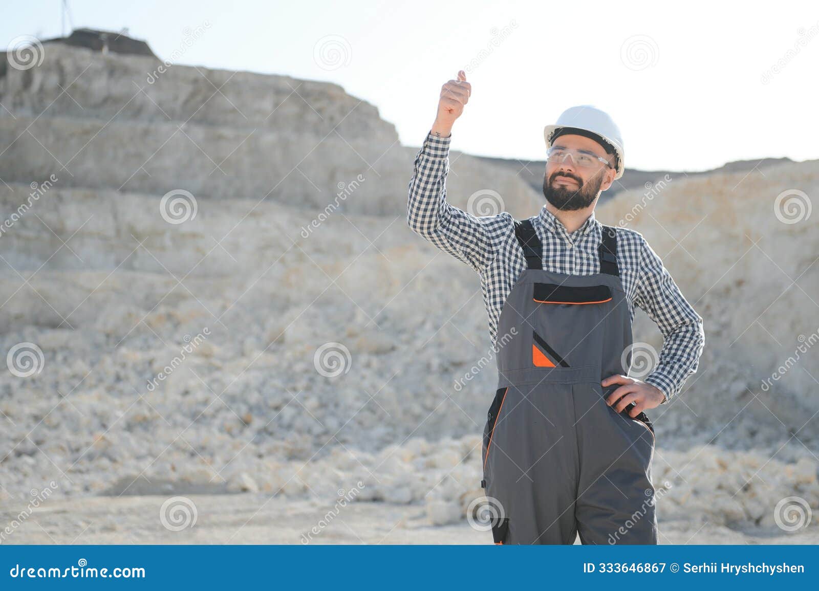 Extraction of Stone. Male Worker Next To Stone Quarry Stock Image ...