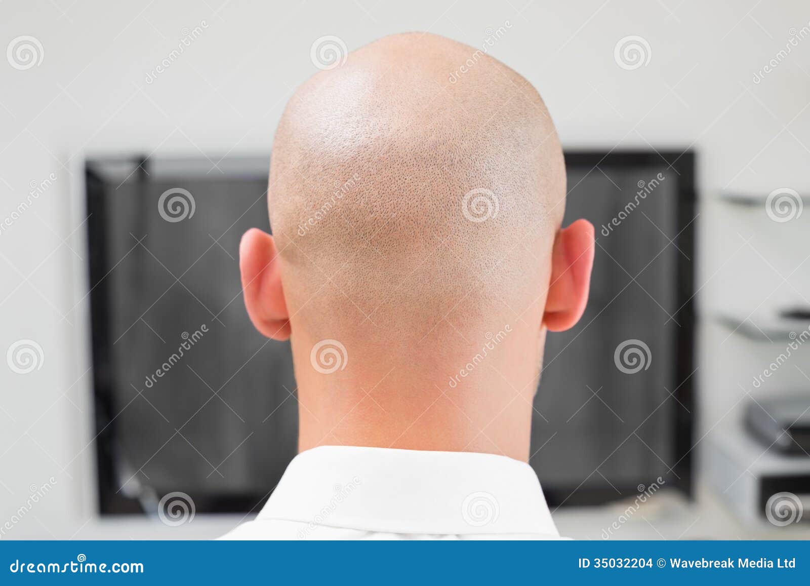Extreme Close Up of a Bald Man Using Computer Stock Photo - Image of ...