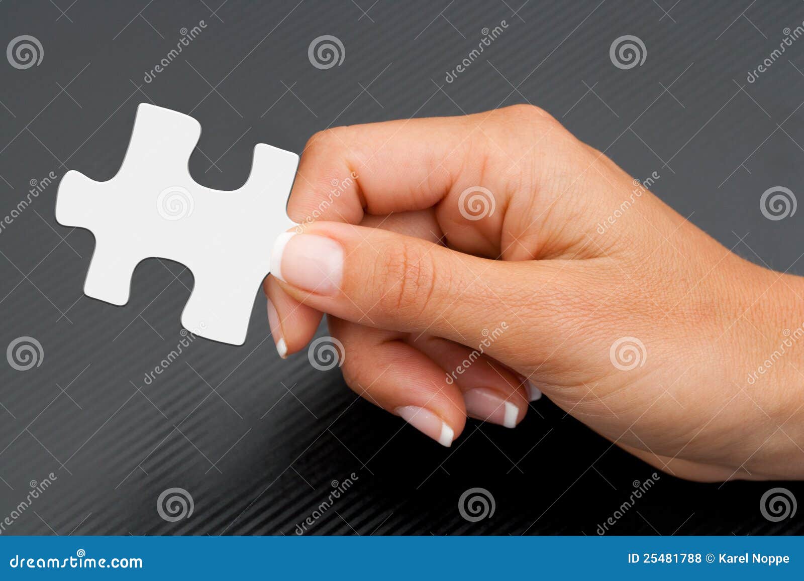 Extreme Close Up of Hand Holding Puzzle Piece. Stock Photo - Image of ...