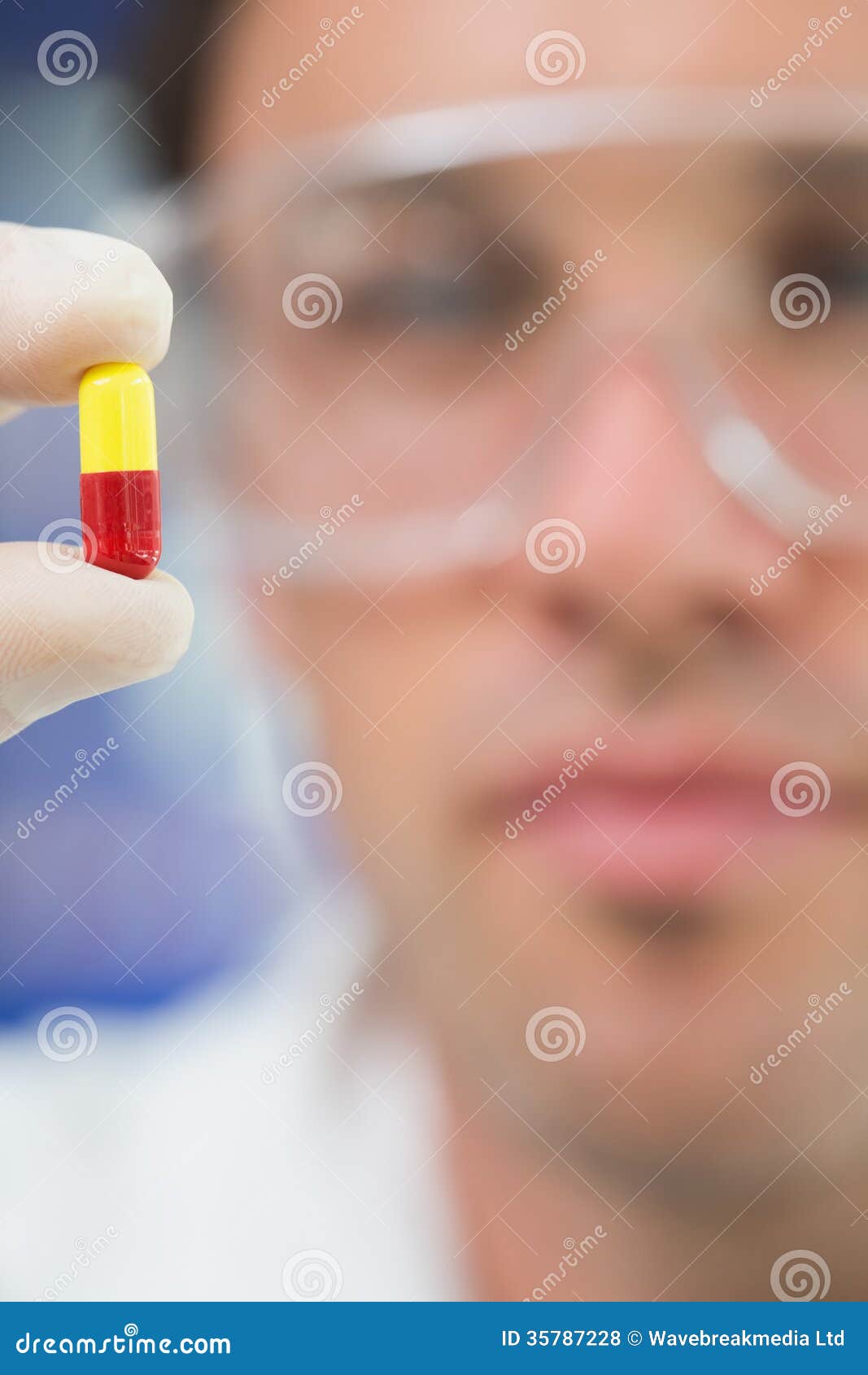 Extreme Close Up of a Scientist Analyzing a Pill Stock Photo - Image of ...