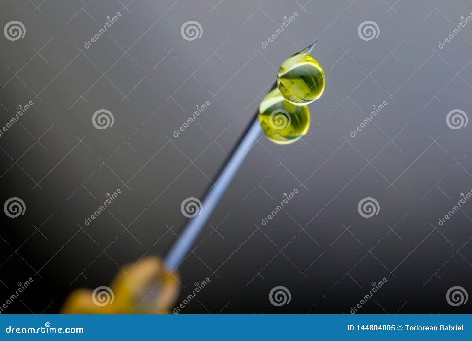 Extreme Macro View of a Hypodermic Needle with Two Drops of Drug ...