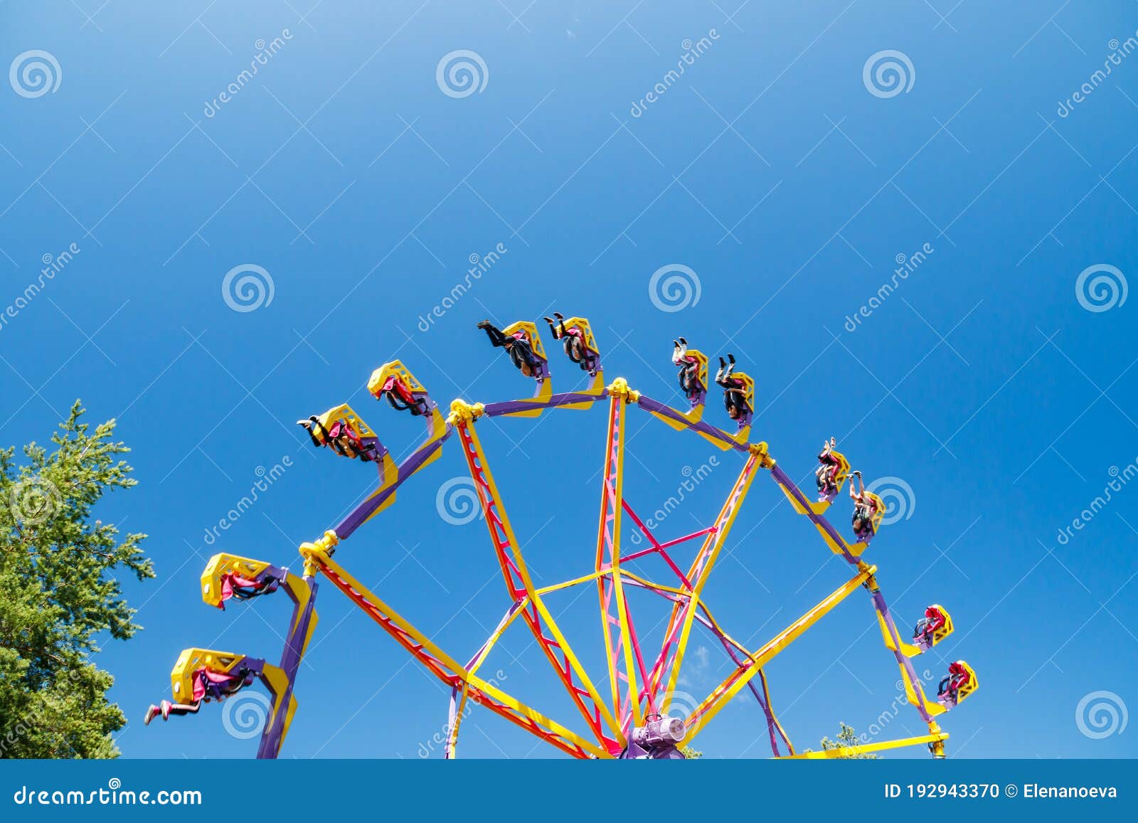 Extreme Ride in Motion in Amusement Park at Sunny Day Editorial Image ...