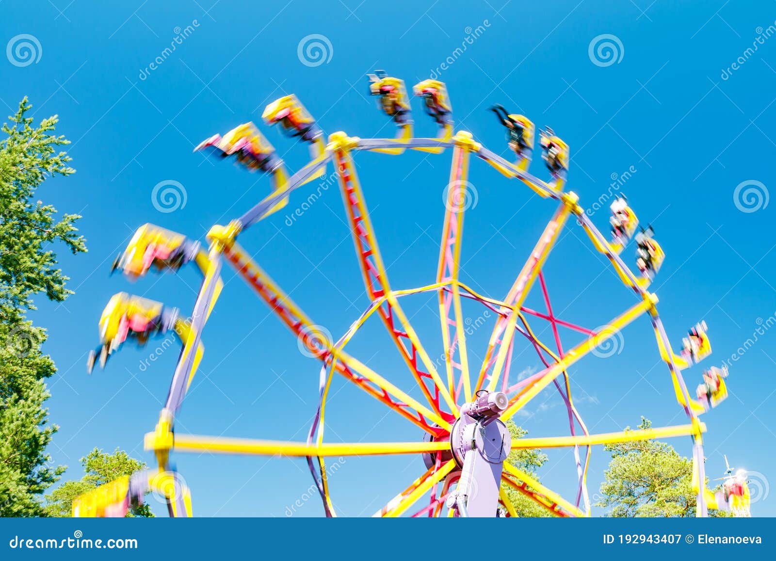 Extreme Ride in Motion in Amusement Park at Sunny Day Stock Image ...