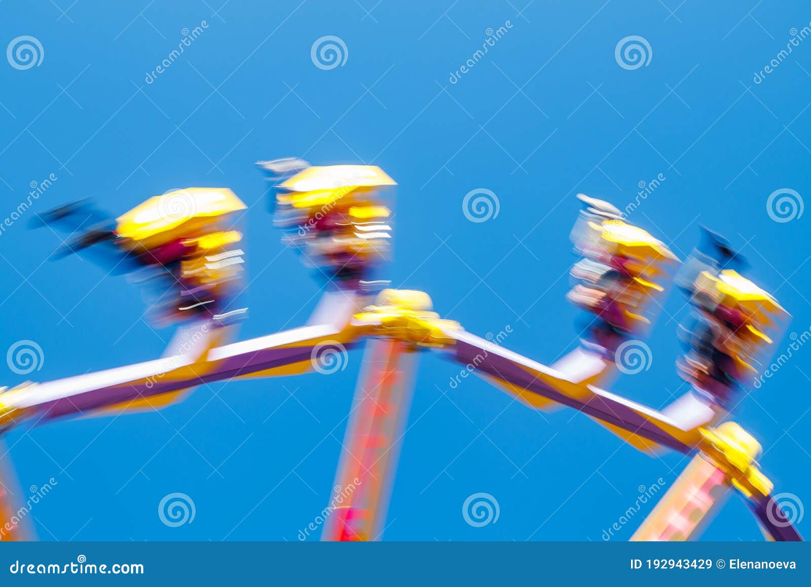 Extreme Ride in Motion in Amusement Park at Sunny Day Stock Image ...