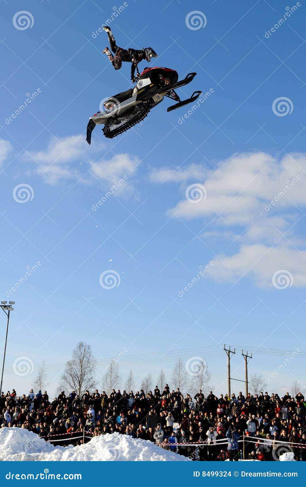 Extreme snowmobile jumping editorial stock image. Image of fast - 8499324