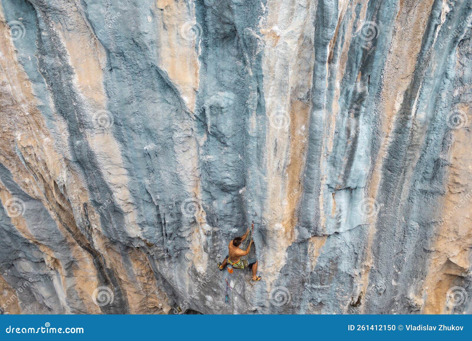 Extreme Sport, Strong Man, Rock Climber Climbs a Difficult Route Stock ...