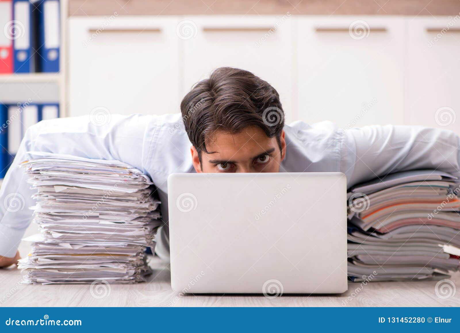 The Extremely Busy Employee Working in the Office Stock Photo - Image ...