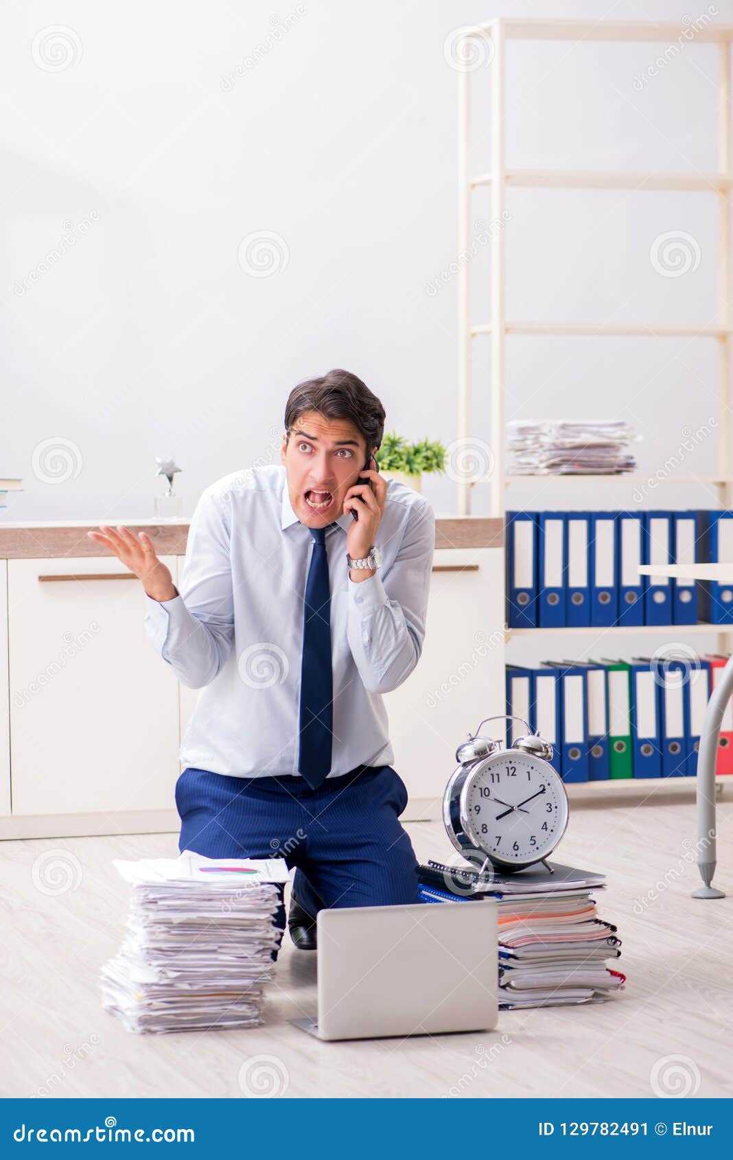 The Extremely Busy Employee Working in the Office Stock Image - Image ...