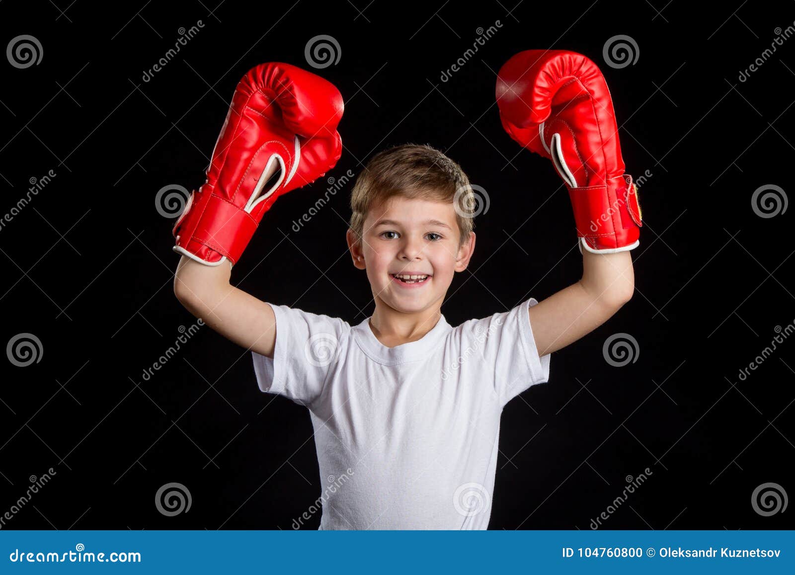 Extremely Happy and Successful Little Boxer with Both Hands Up in Red ...