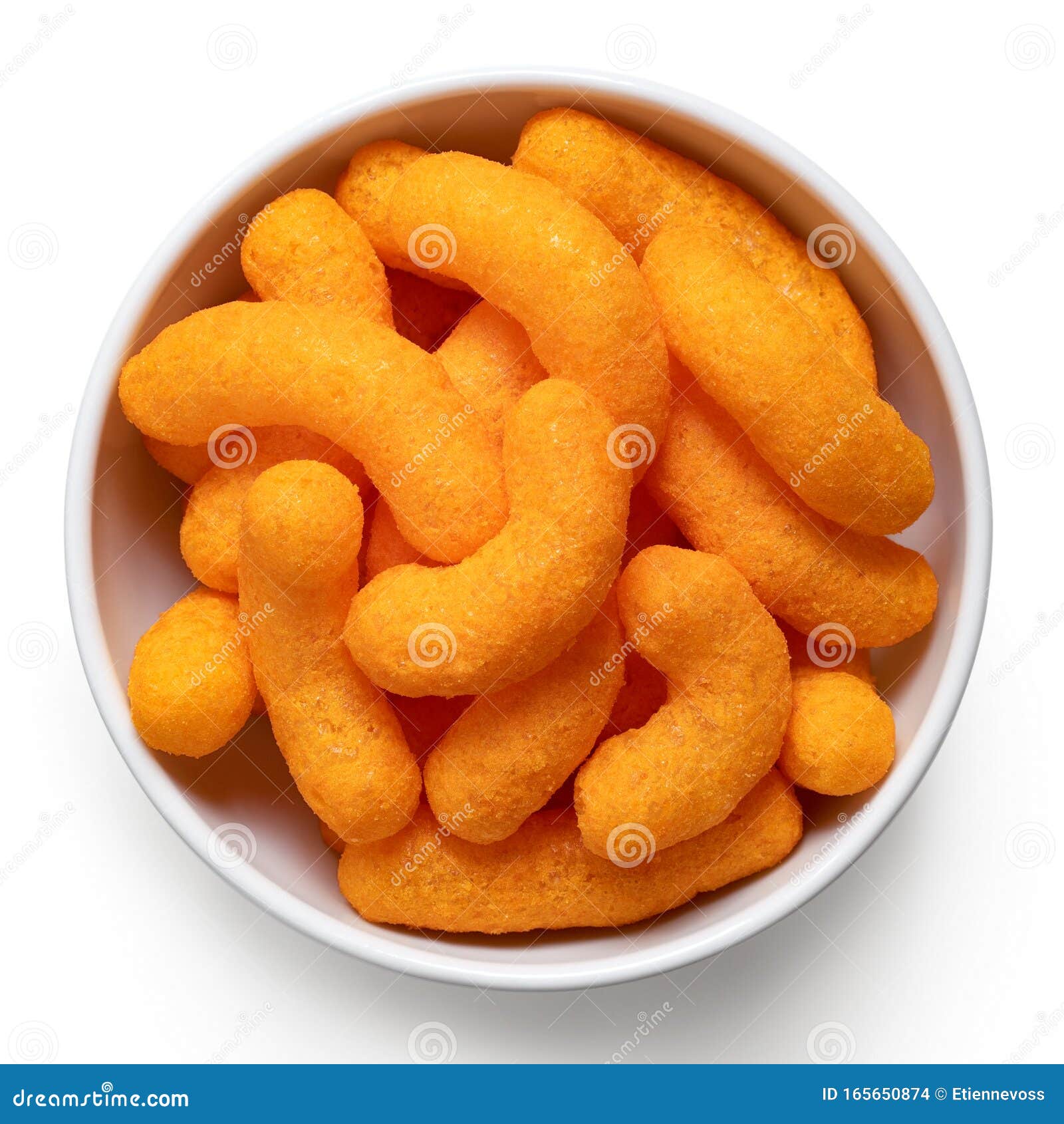 Extruded Cheese Puffs In A White Ceramic Bowl Isolated On White. Top ...