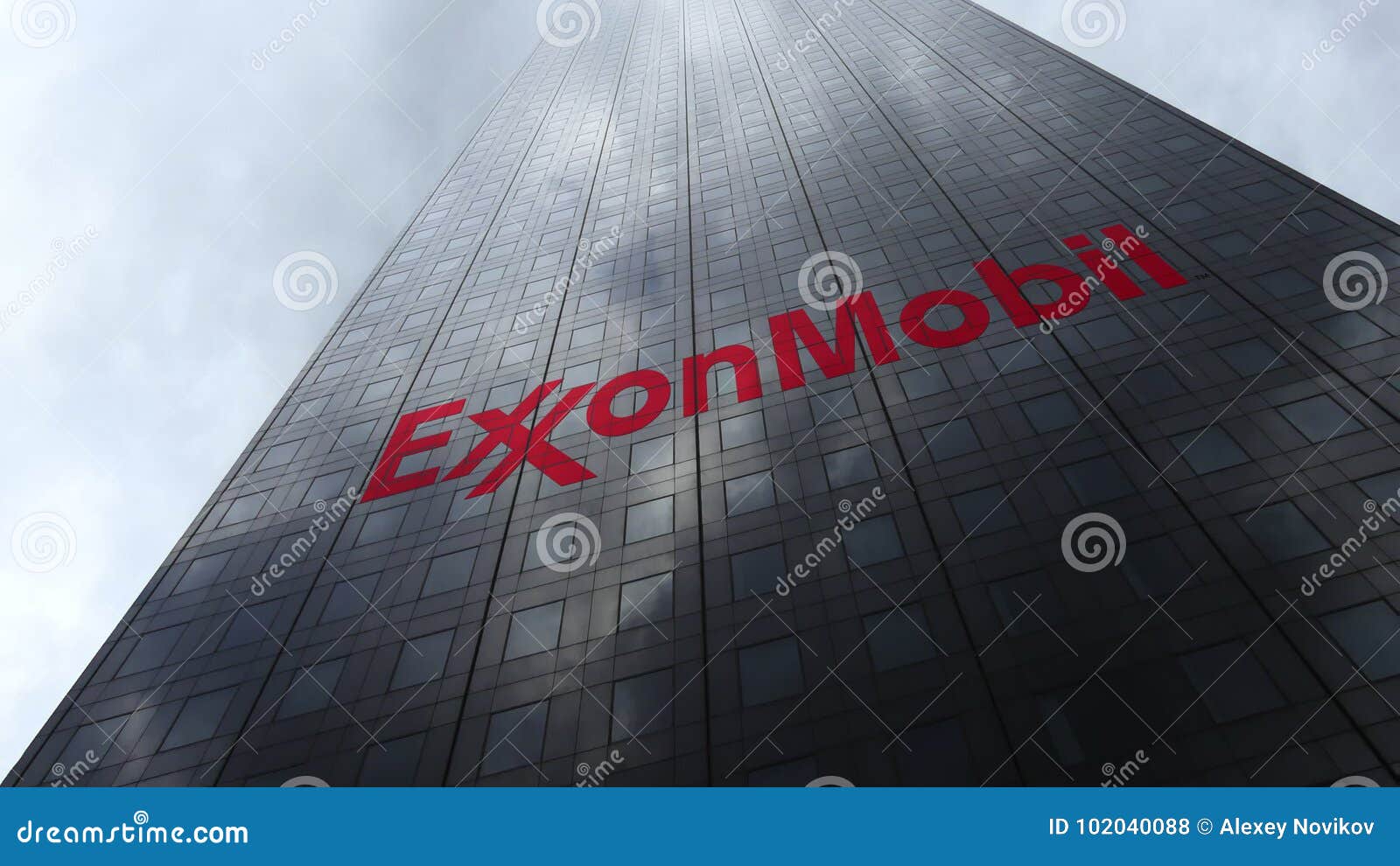ExxonMobil Logo On A Skyscraper Facade Reflecting Clouds. Editorial 3D ...