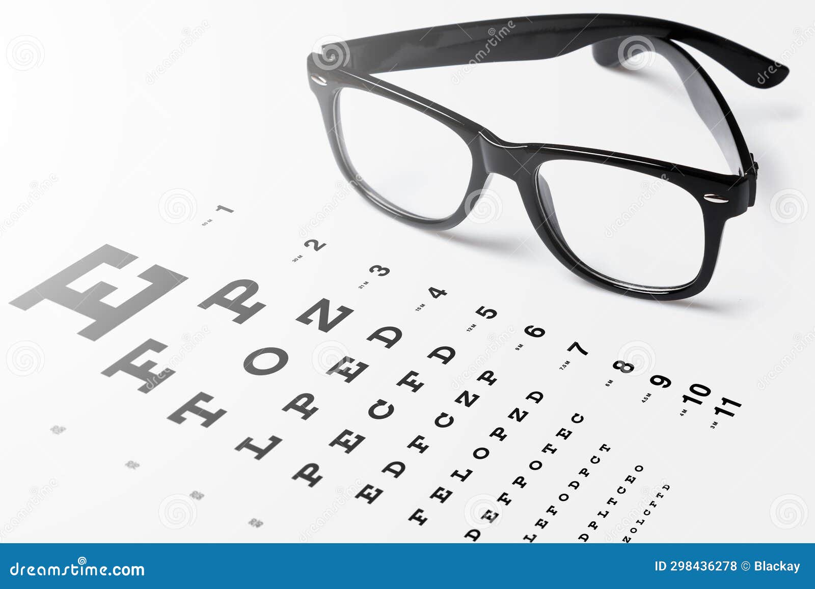 Eye Chart for Visual Acuity Testing and Black Rimmed Eyeglasses Stock ...