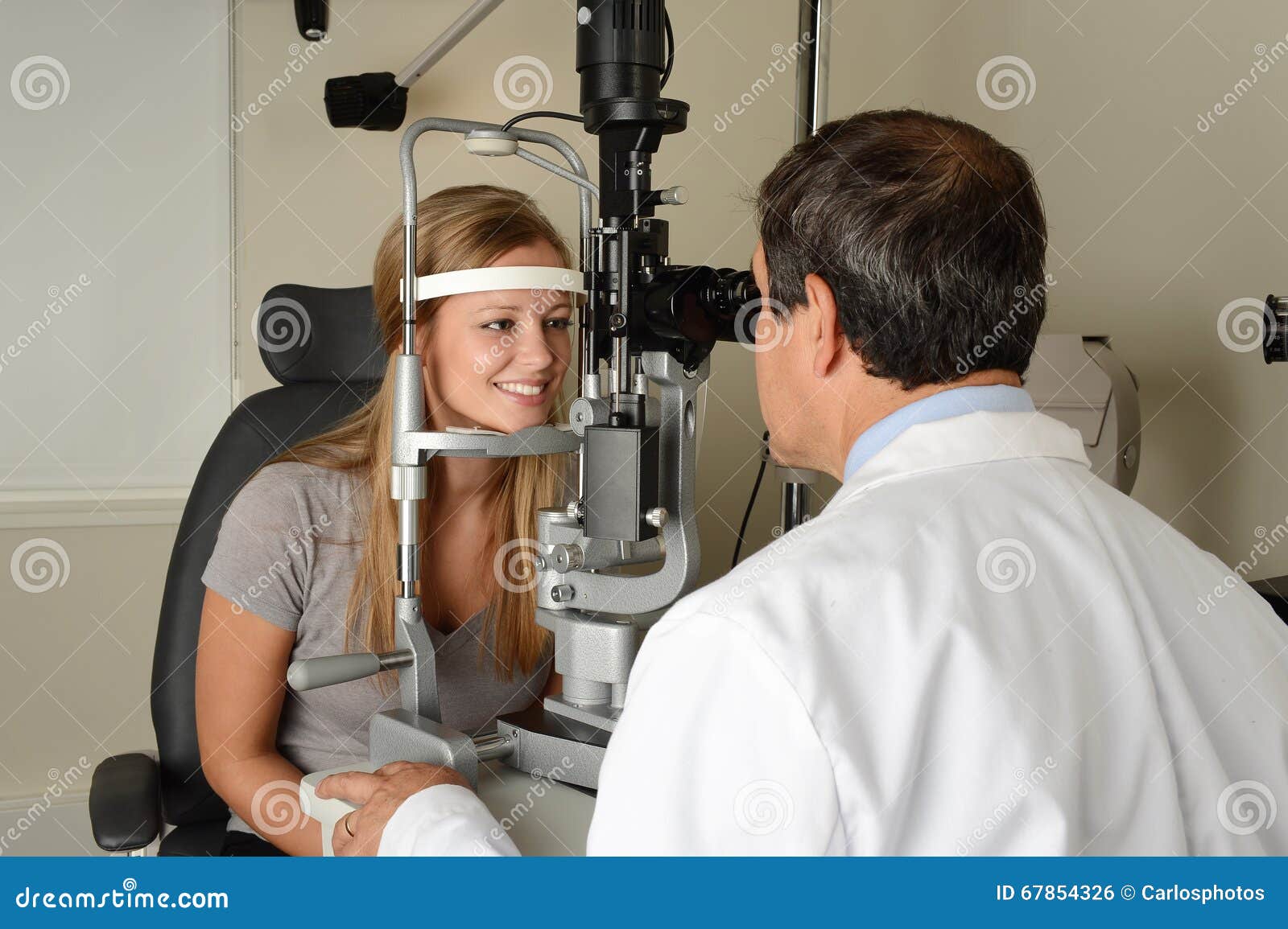 Eye Doctor with Young Pacient Stock Photo - Image of ophthalmology ...