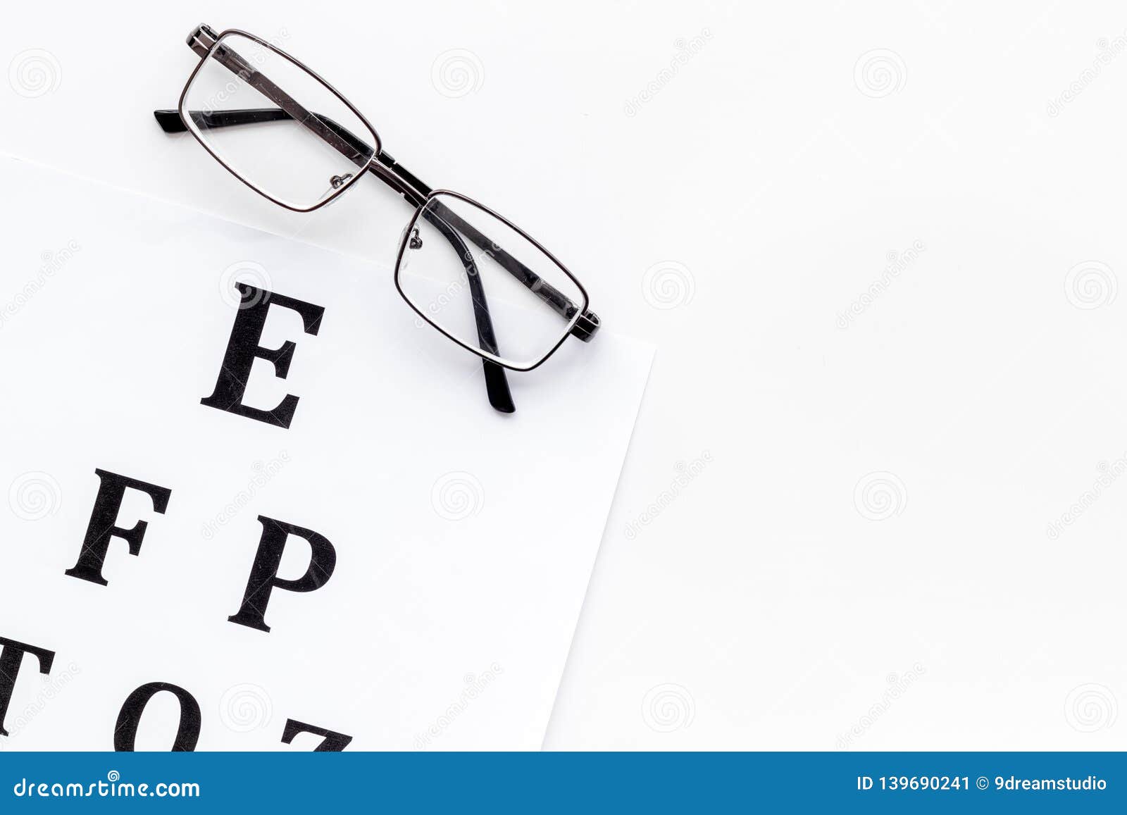 Eye Examination. Eyesight Test Chart and Glasses on White Background ...