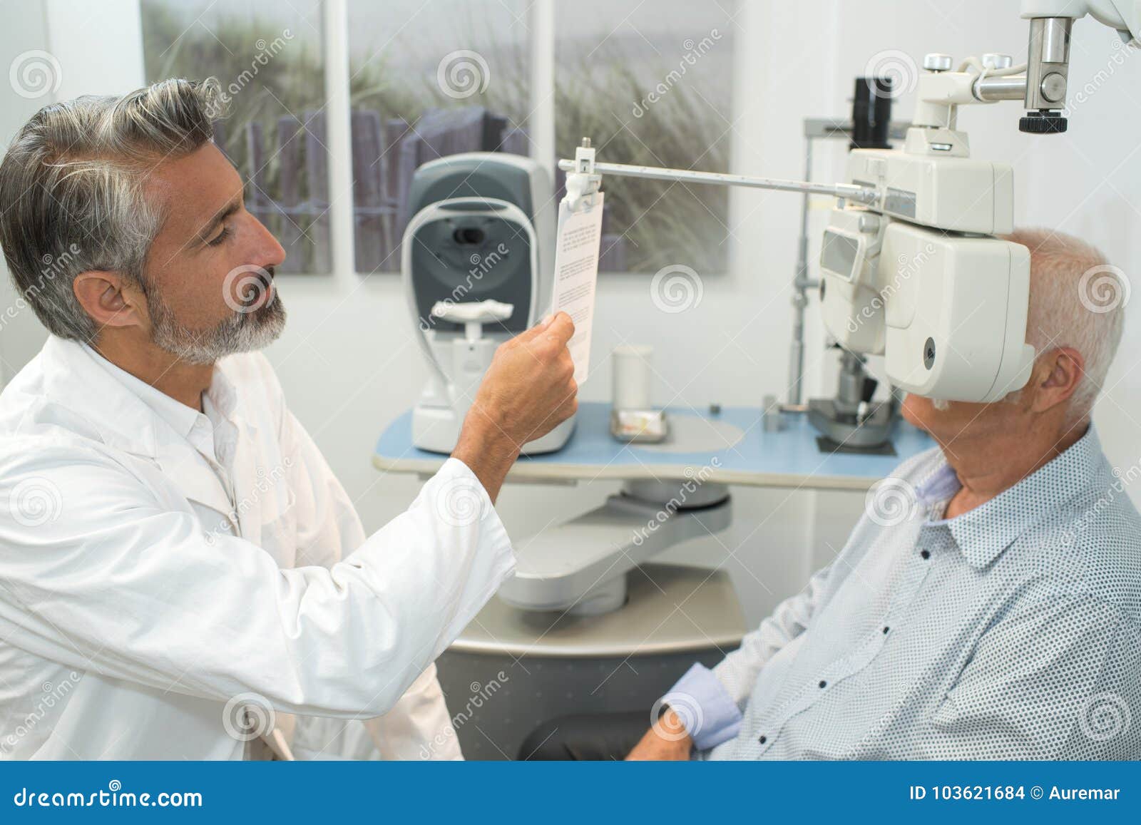 Eye Examination at Slit Lamp Stock Photo - Image of examination ...