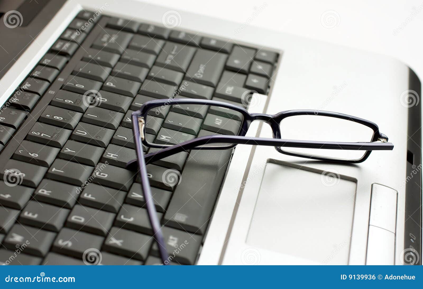 Eye glasses on laptop stock photo. Image of view, white - 9139936