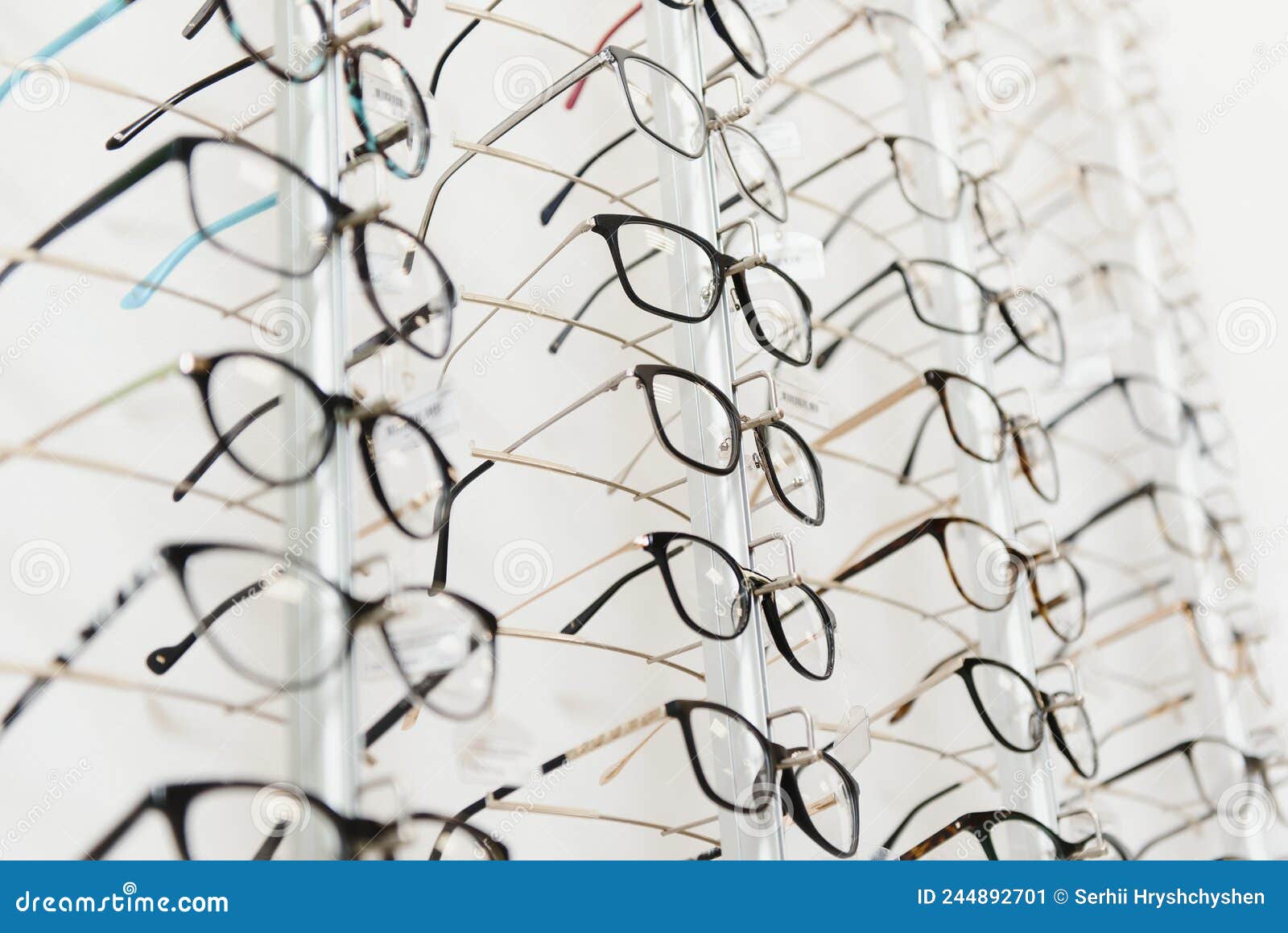 Eye glasses on the shelf. stock image. Image of choice - 244892701