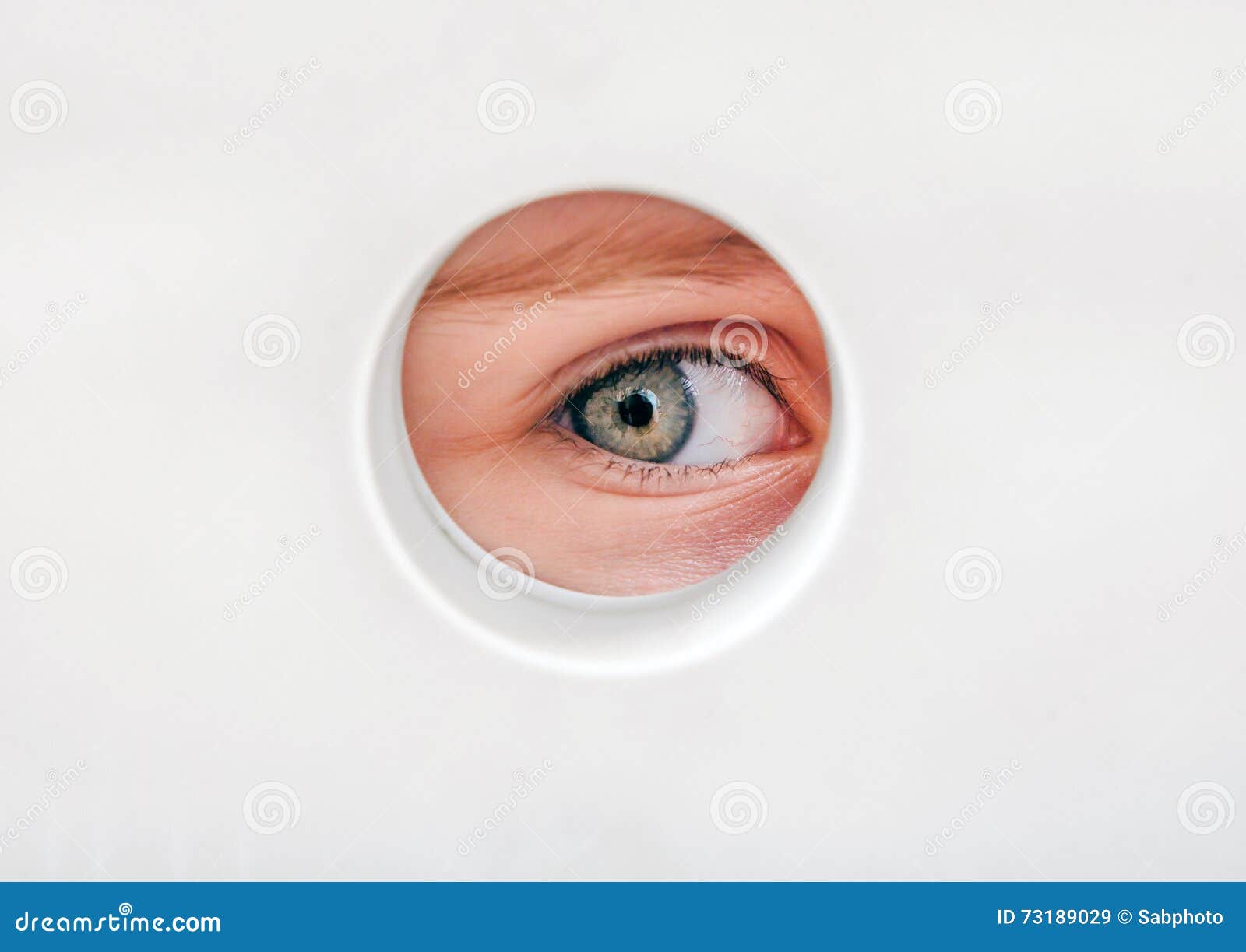Eye in the Hole stock image. Image of hiding, hole, eyeball - 73189029