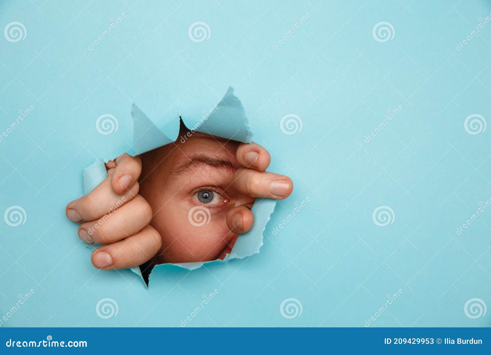 Eye Looking through Hole in Paper Stock Image - Image of mystery ...