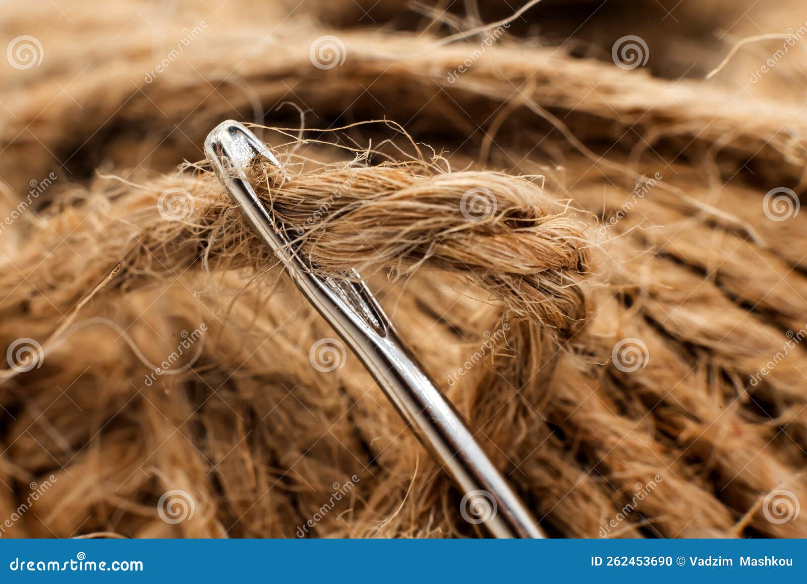 The Eye of a Needle for Sewing with Thread Close-up. Needle with Twine ...