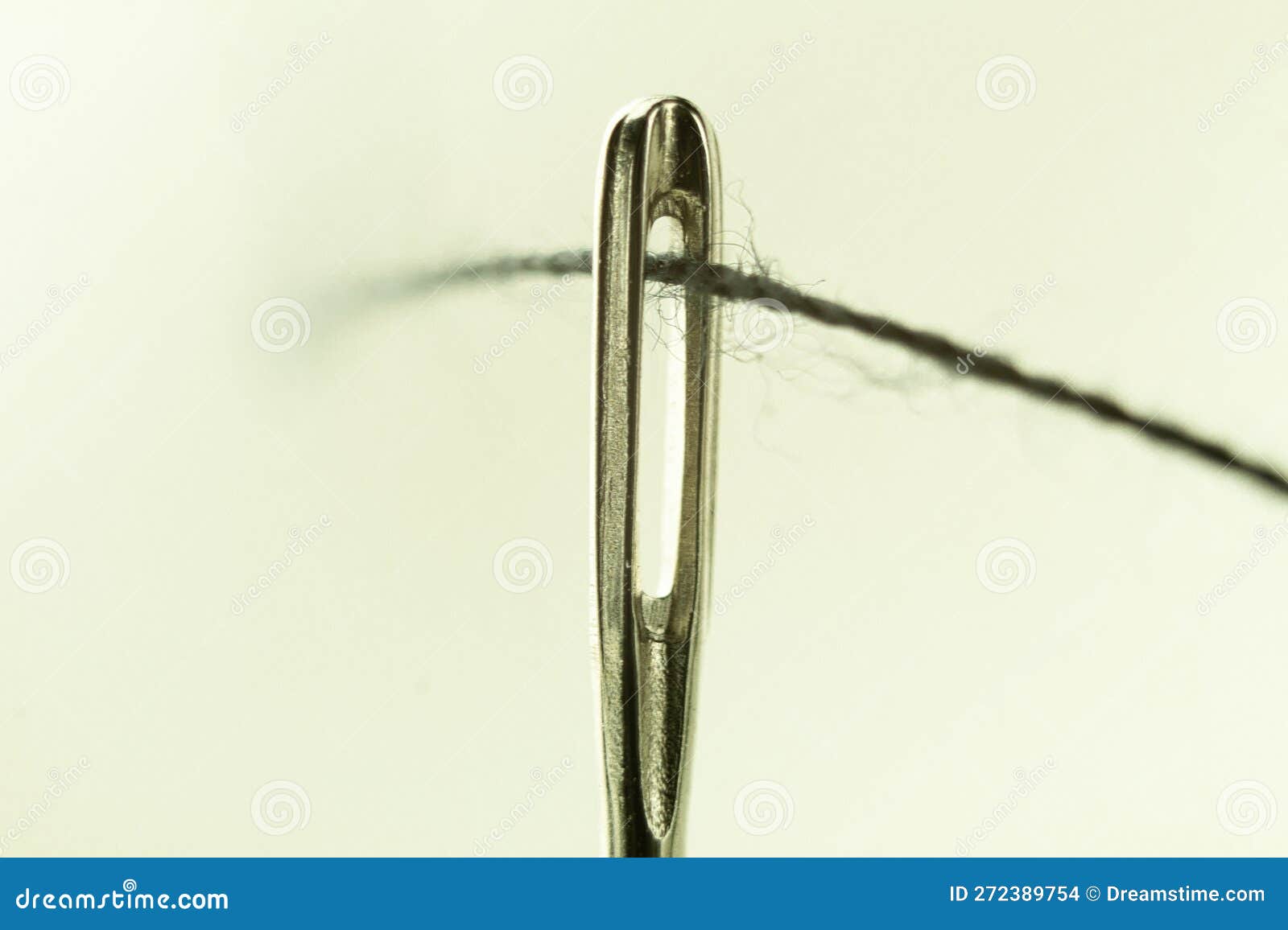 The Eye of a Needle with a Thread Close-up Stock Photo - Image of micro ...