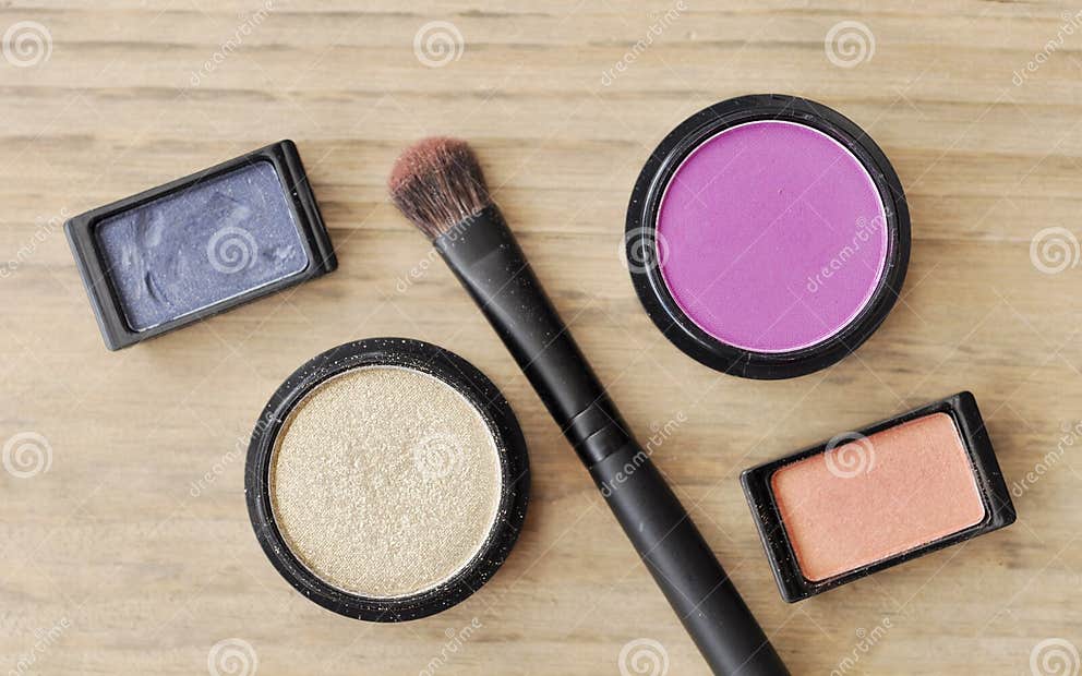 Eye Shadows and Brush on Wood Table Stock Photo - Image of beige ...