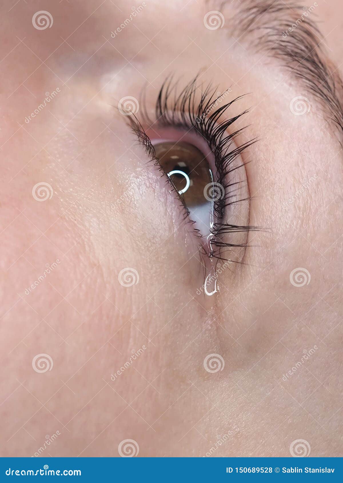 Eye with tear. Close up. stock photo. Image of miserable - 150689528