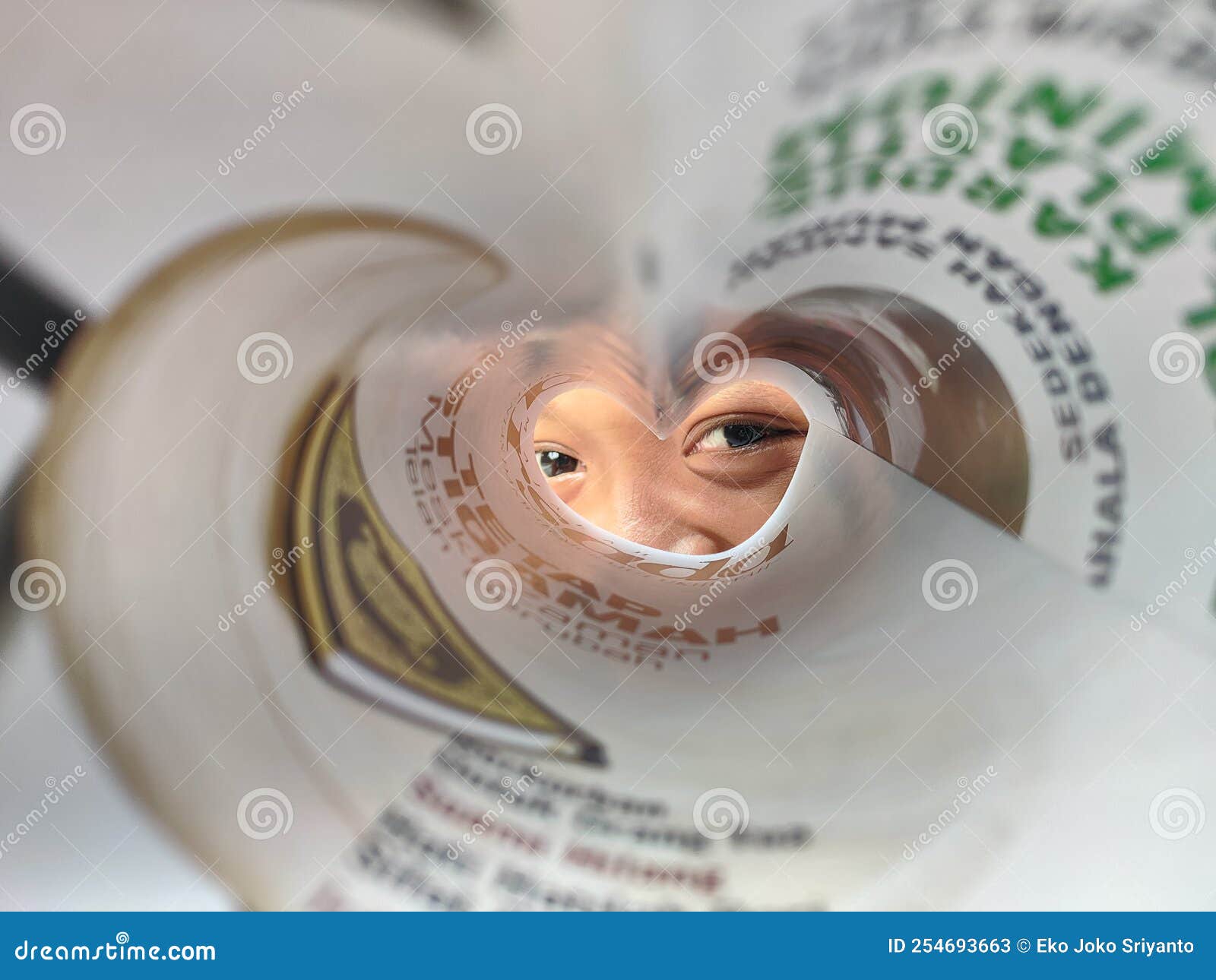 An Eye View through a Rolled Paper Stock Image - Image of dessert ...