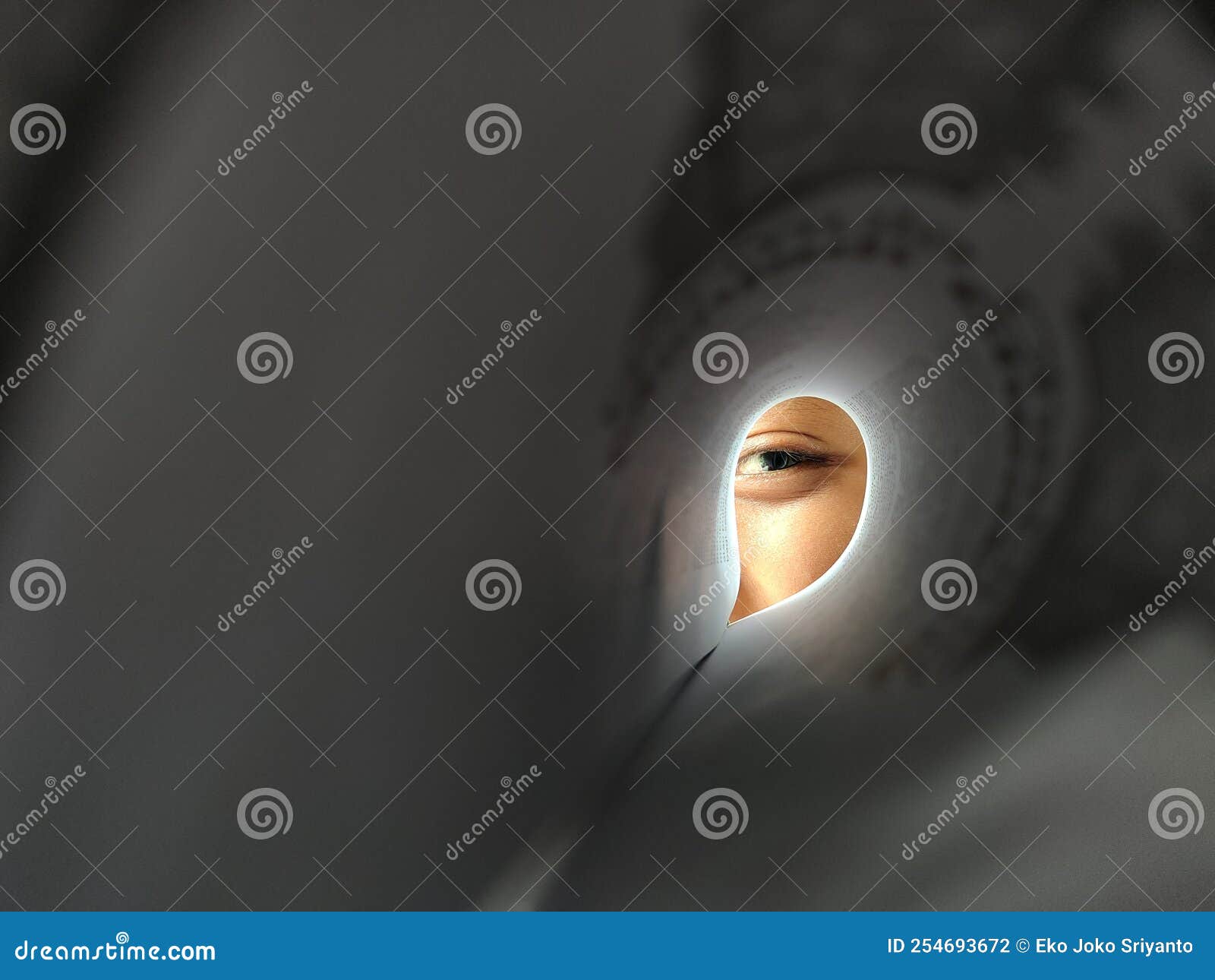 An Eye View through a Rolled Paper Stock Photo - Image of light, organ ...