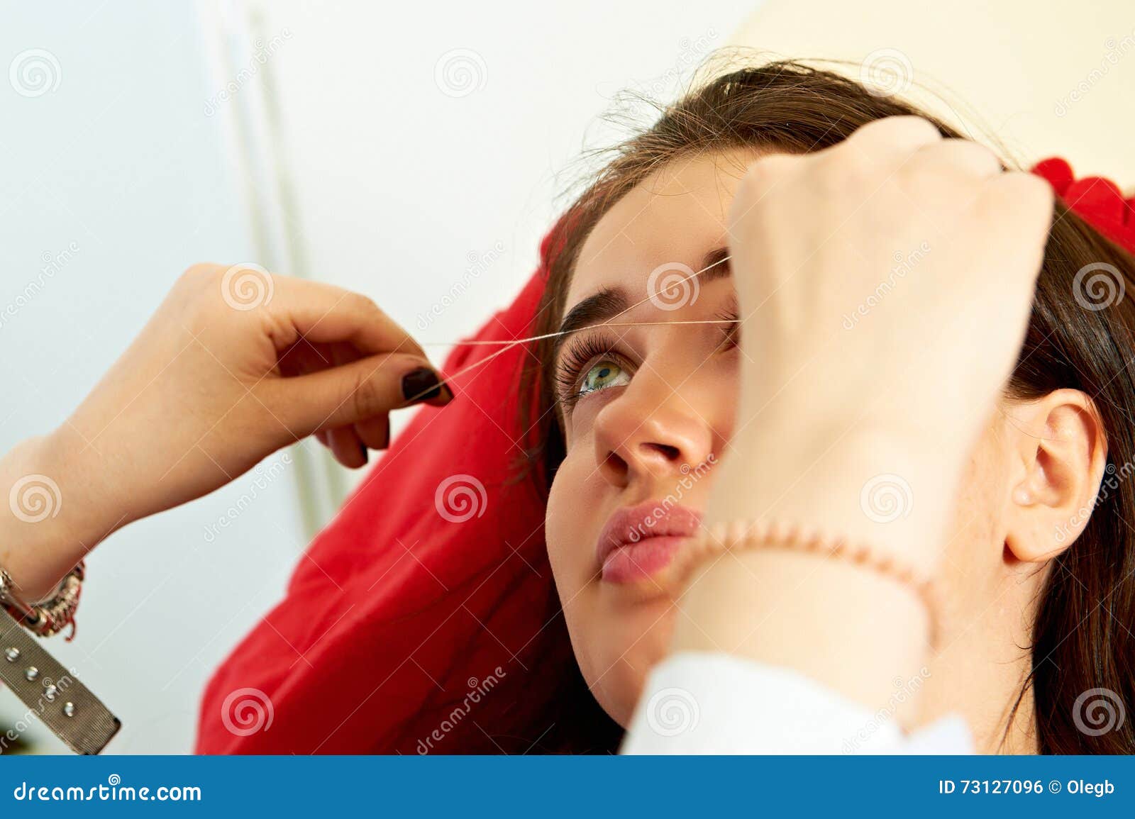 Eyebrow thread correction stock photo. Image of facial - 73127096