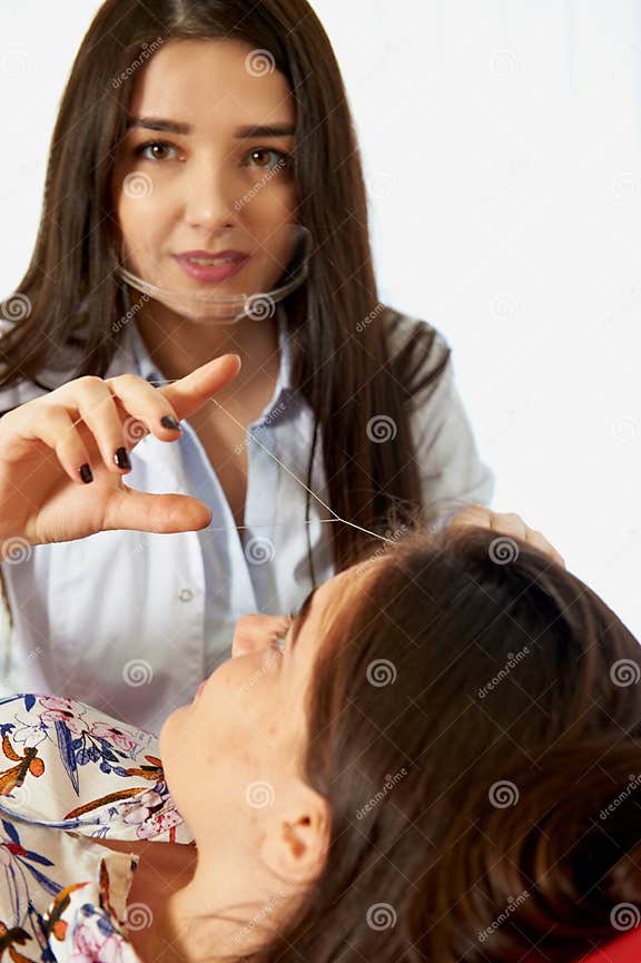 Eyebrow thread correction stock photo. Image of care - 73511842