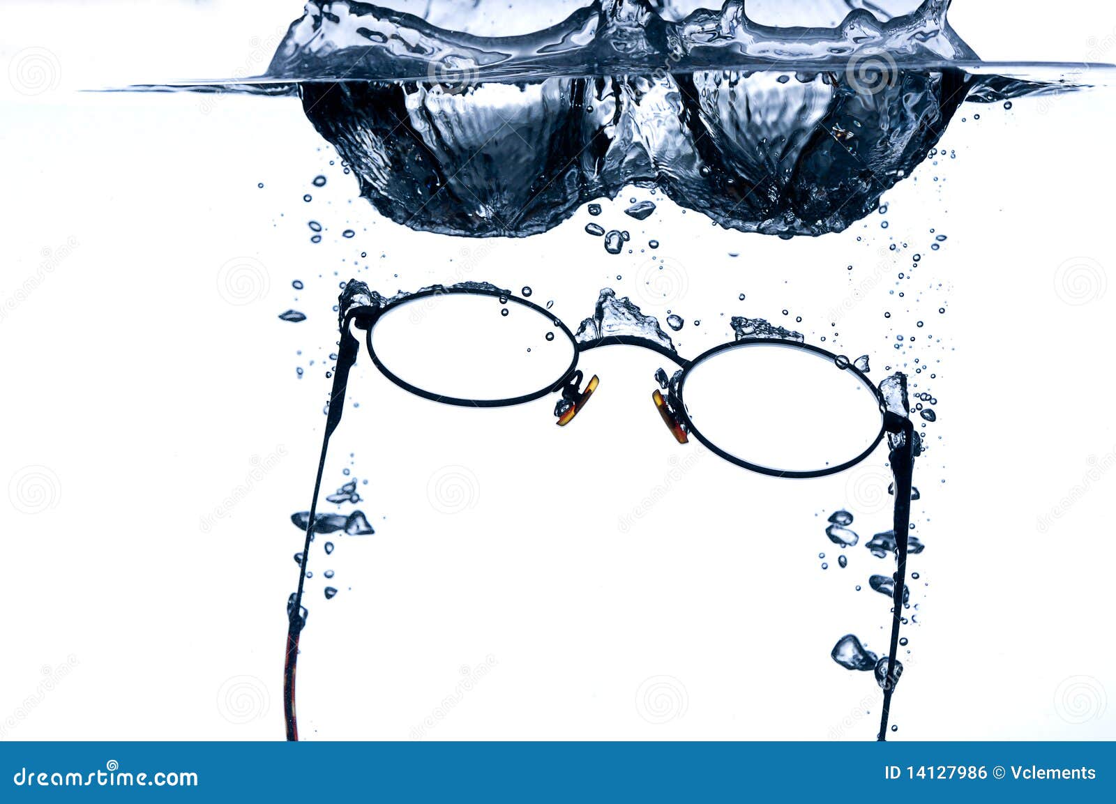 Eyeglass splashing in wate stock photo. Image of transparent - 14127986