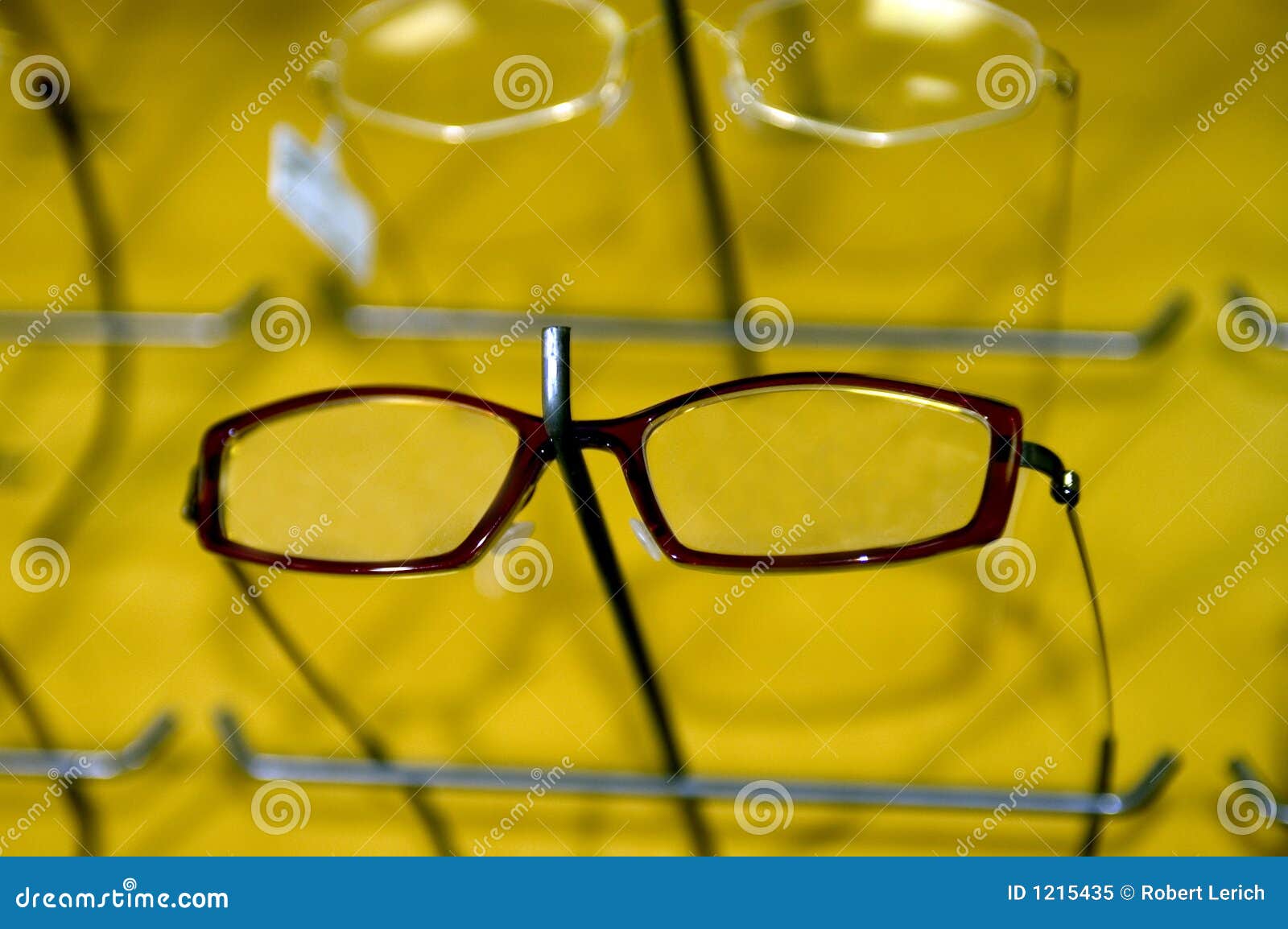 Eyeglasse Frames on Wall Display Stock Image - Image of light, glasses ...