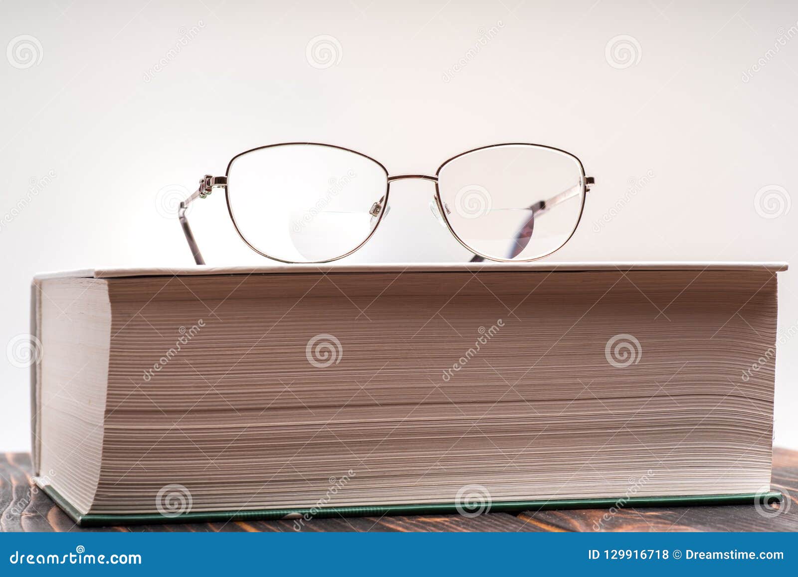 Eyeglasses with Bifocal Lenses on Book Stock Photo - Image of ...