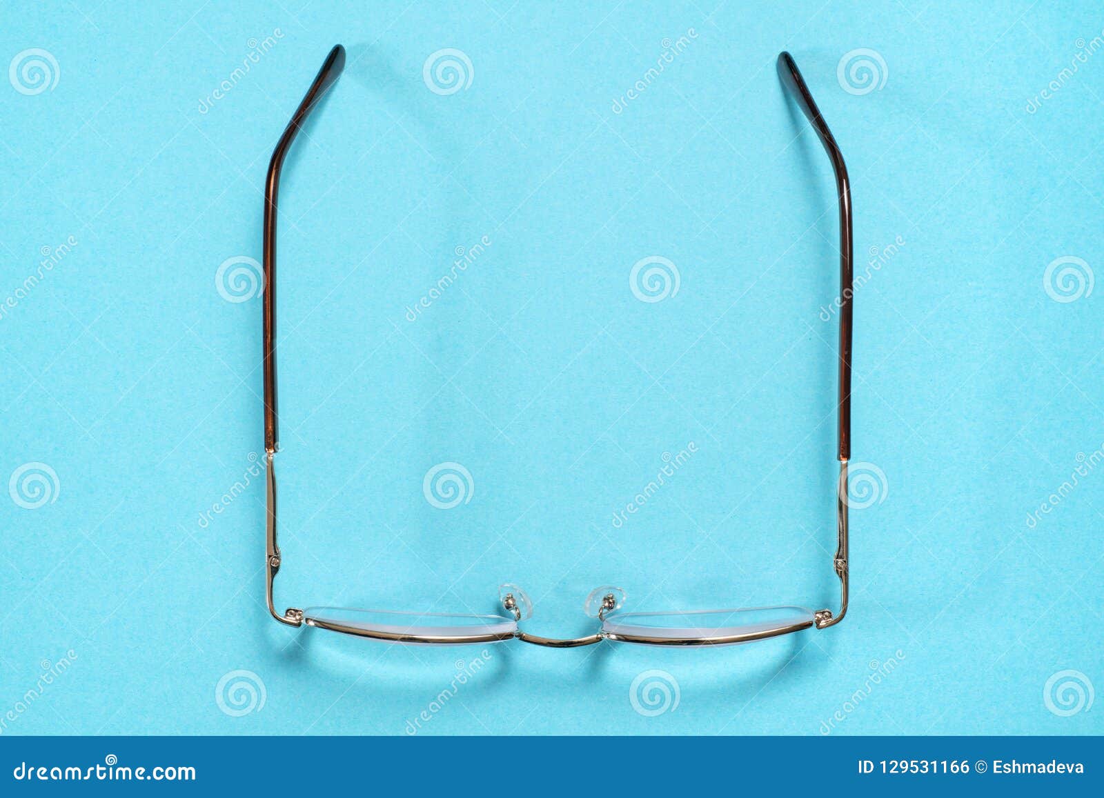 Eyeglasses on Blue Top View Stock Photo - Image of modern, still: 129531166