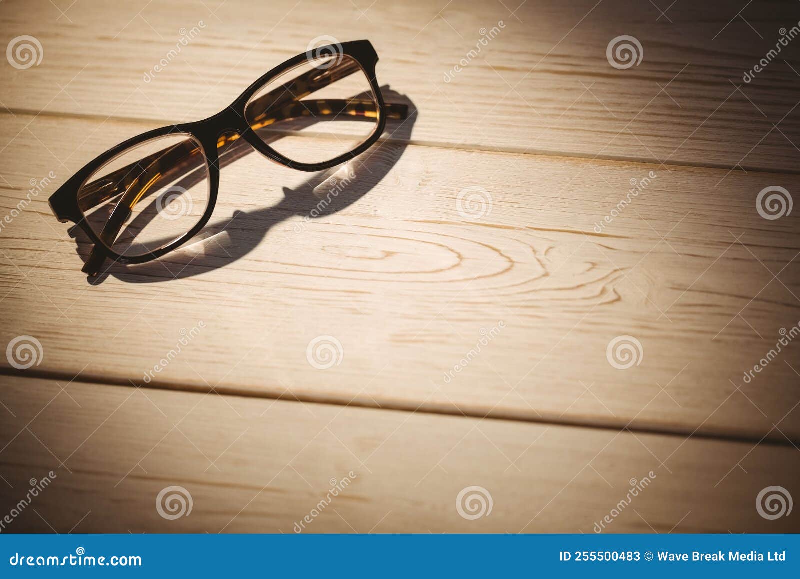 Eyeglasses kept on table stock image. Image of eyeglasses - 255500483