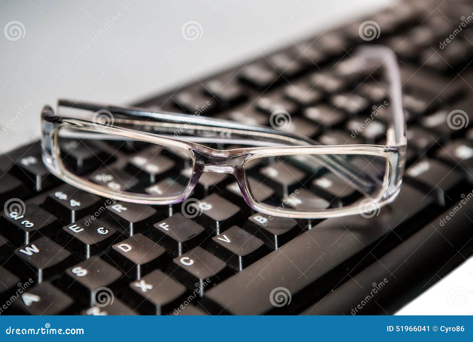 Eyeglasses with keyboard stock image. Image of montatura - 51966041