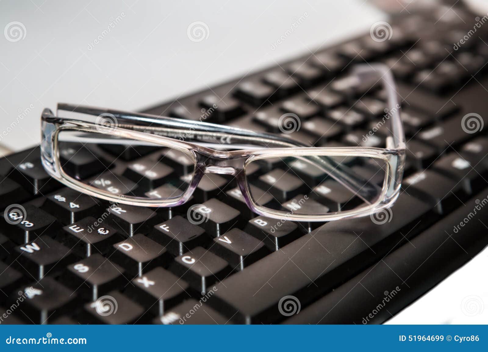 Eyeglasses with keyboard stock image. Image of glasses - 51964699