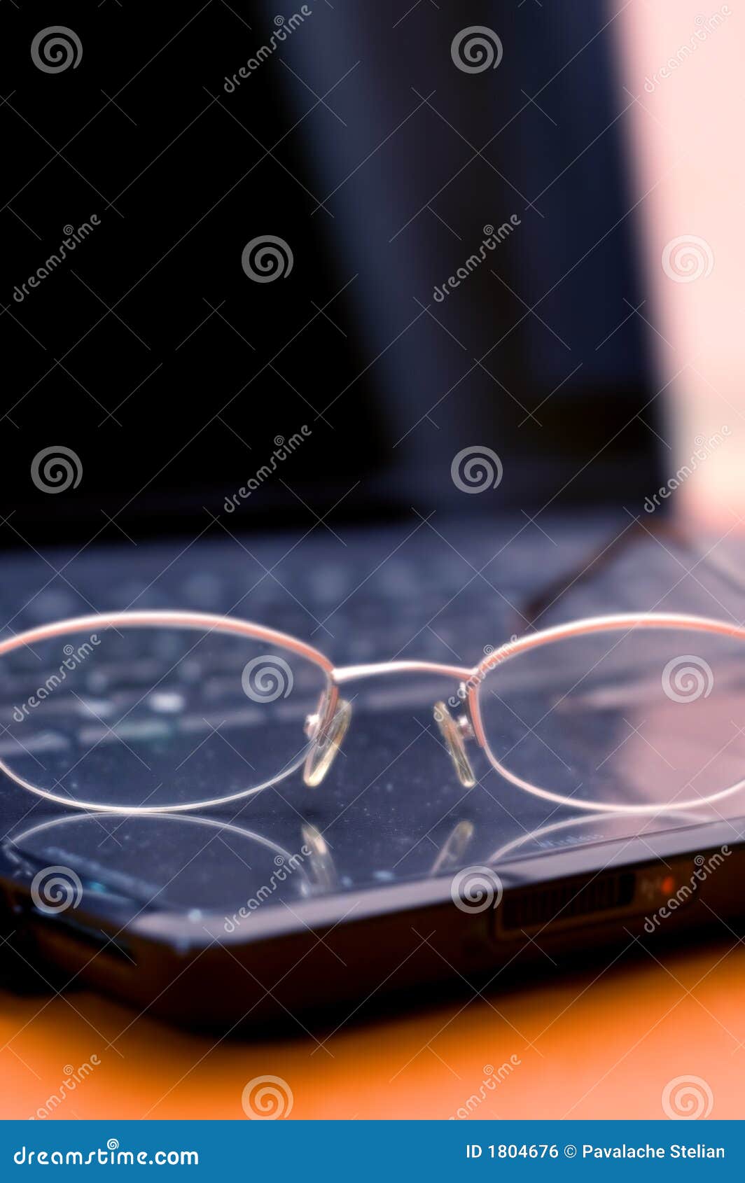 Eyeglasses on a Laptop stock photo. Image of screen, nose - 1804676