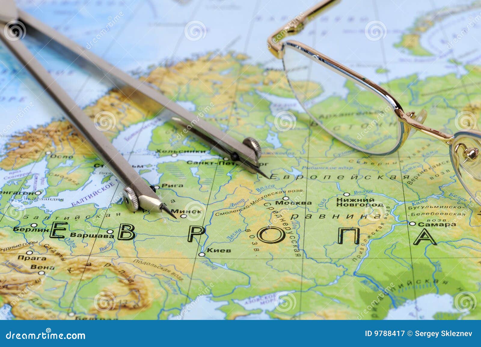 Eyeglasses and a Measuring Instrument Stock Image - Image of geography ...