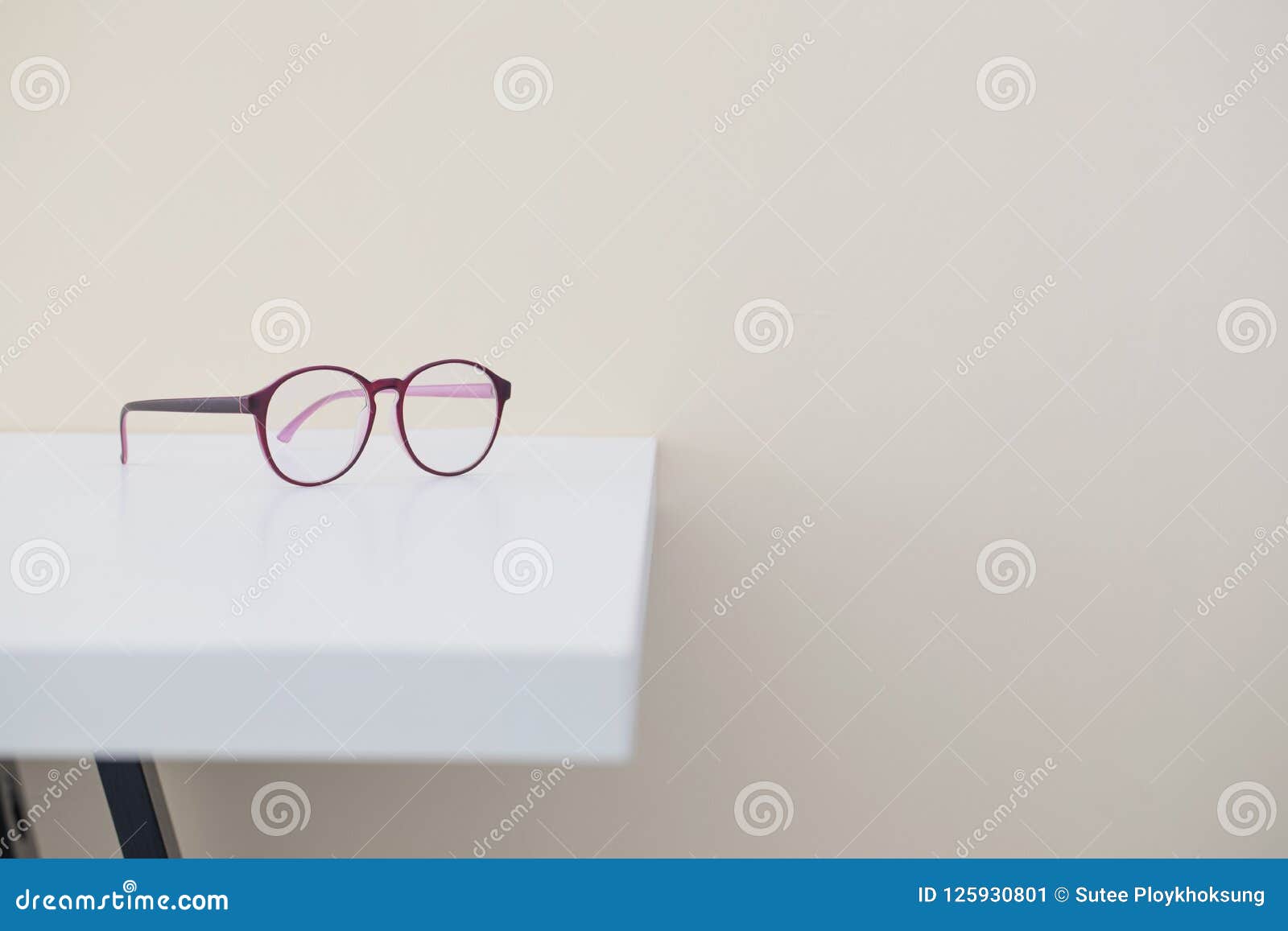 Eyeglasses on white table stock image. Image of offices - 125930801