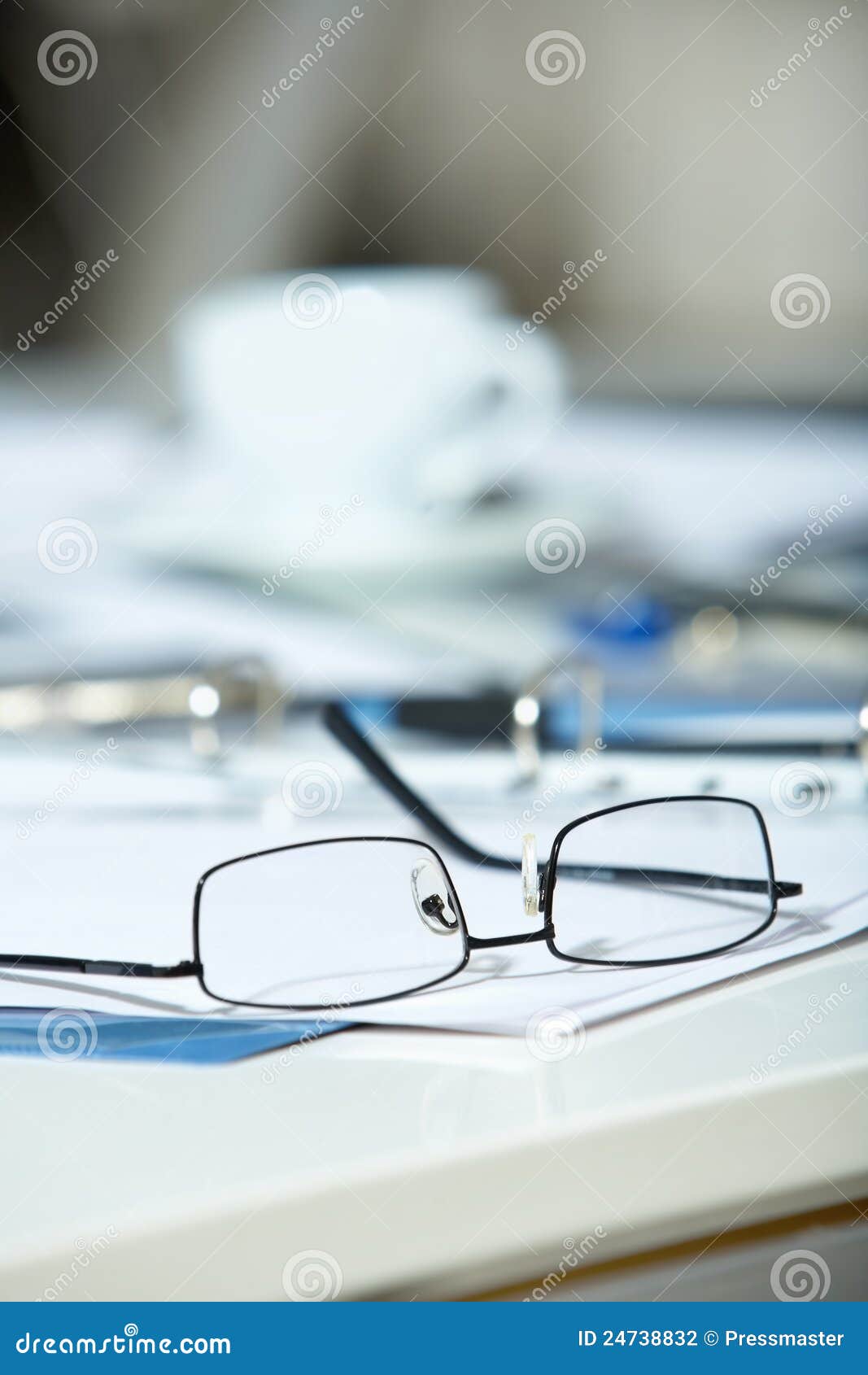Eyeglasses on workplace stock photo. Image of optics - 24738832