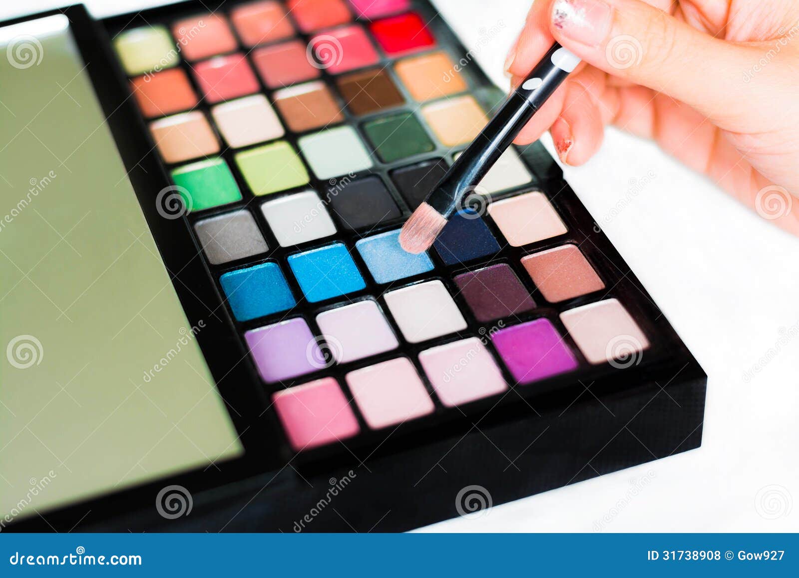 Eyeshadow Palette Closeup with a Woman Hand Stock Photo - Image of ...